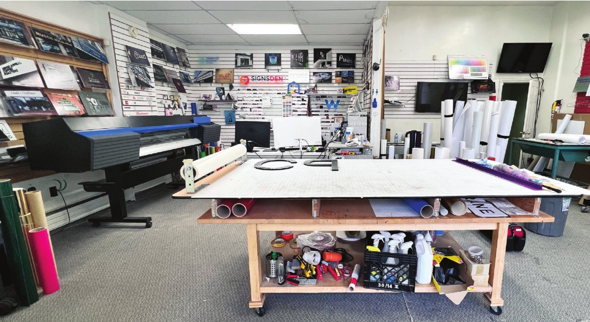 Displaying His Pride For Signmaking - Business Signs | Signs Den ...